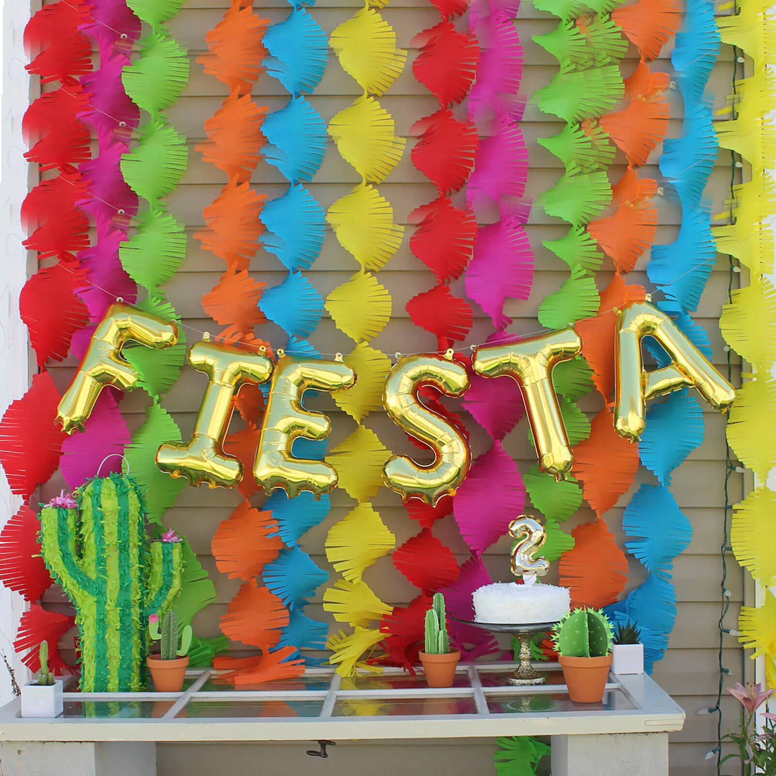 Fringed Paper Streamer Party Backdrops | Party Ideas by a Pro